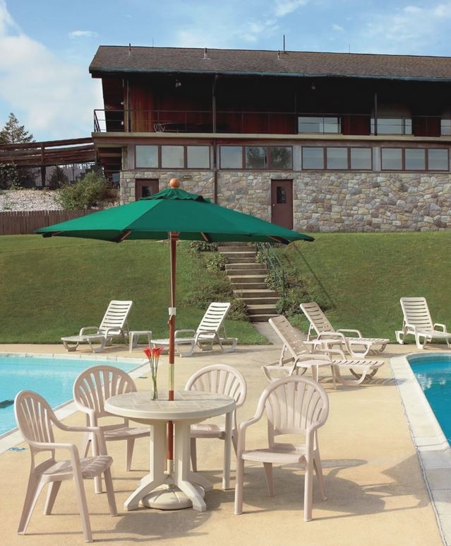 Pacific Fan Back Plastic Resin Stacking Armchair - Picnic Furniture